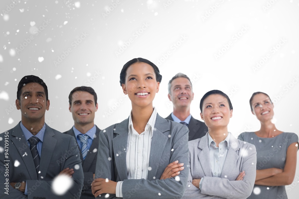 Composite image of business people looking up in office Stock Photo ...