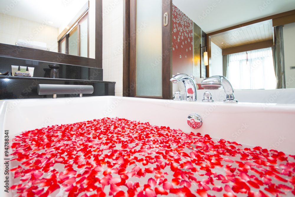beautiful bathtub with red rose petals Stock Photo | Adobe Stock