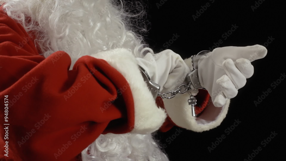 Santa Claus handcuffs side freeing Stock Video | Adobe Stock