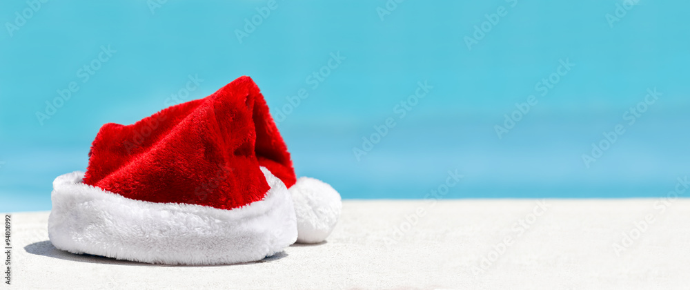 Fotografia do Stock: Santa Claus hat near swimming pool | Adobe Stock