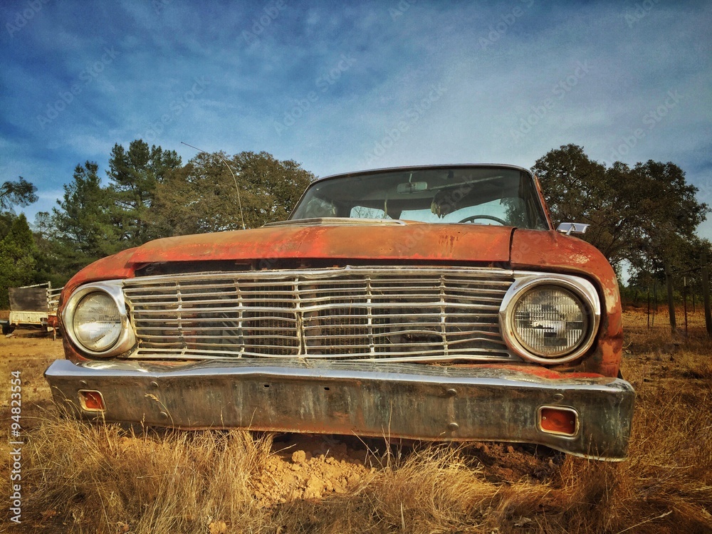 abandoned car at farm field Stock Photo | Adobe Stock