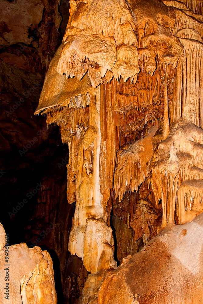 Stalactite and stalagmite formations on the wall of an undergrou Stock ...