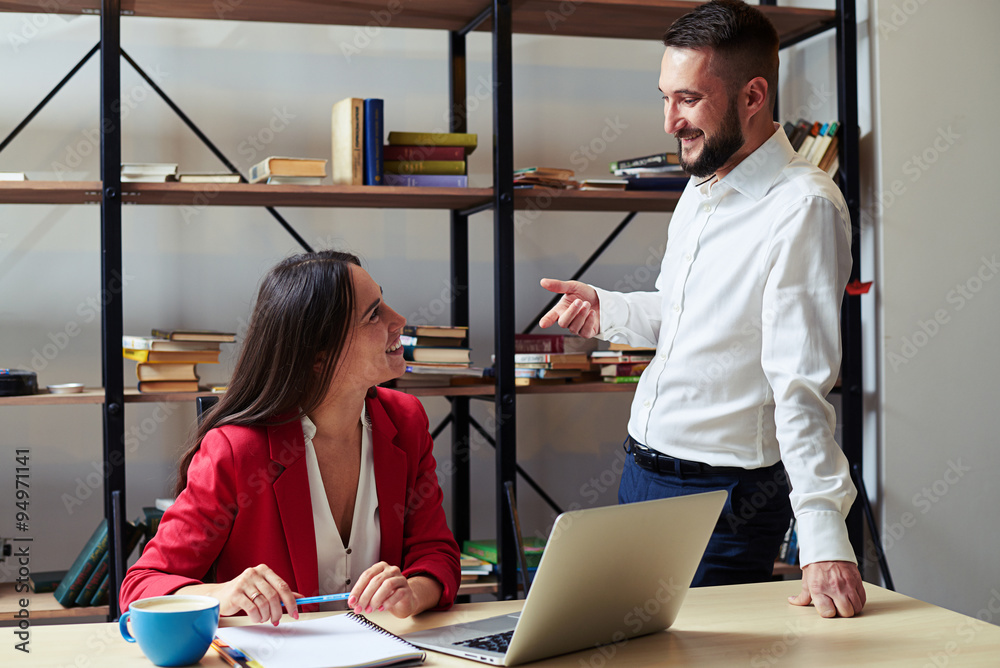 conversation between colleagues in office Stock Photo | Adobe Stock