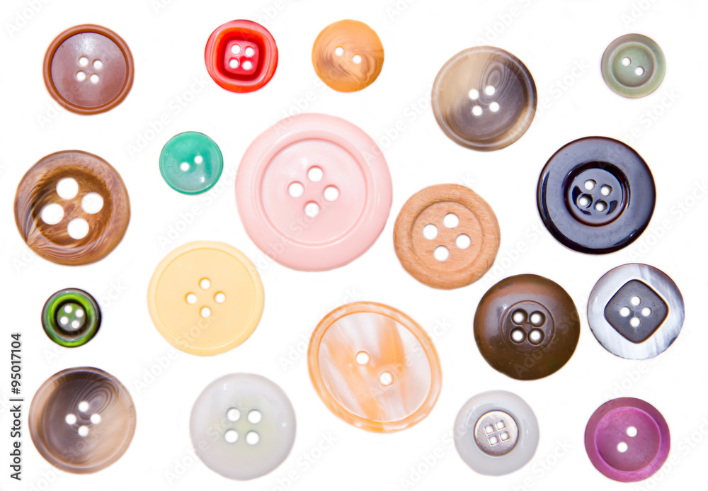 Colored buttons on a white background seen from above Stock Photo ...