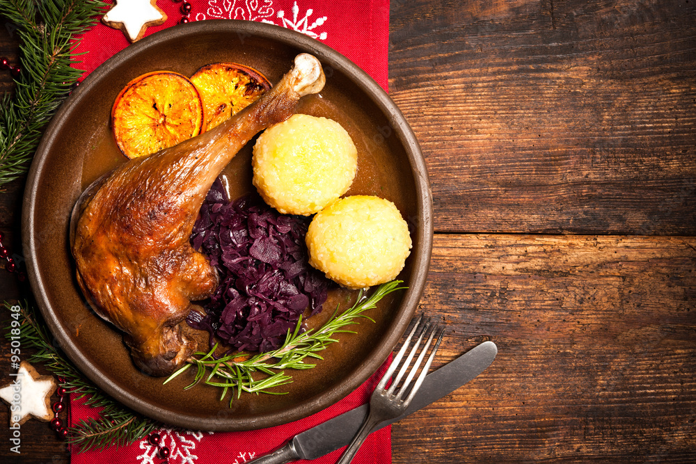 Crusty goose leg with braised red cabbage and dumplings Stock Photo ...