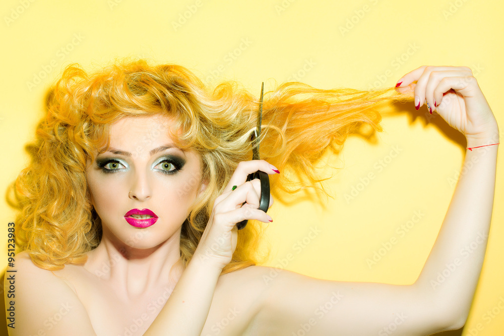 Sexy blonde with scissors Stock Photo | Adobe Stock