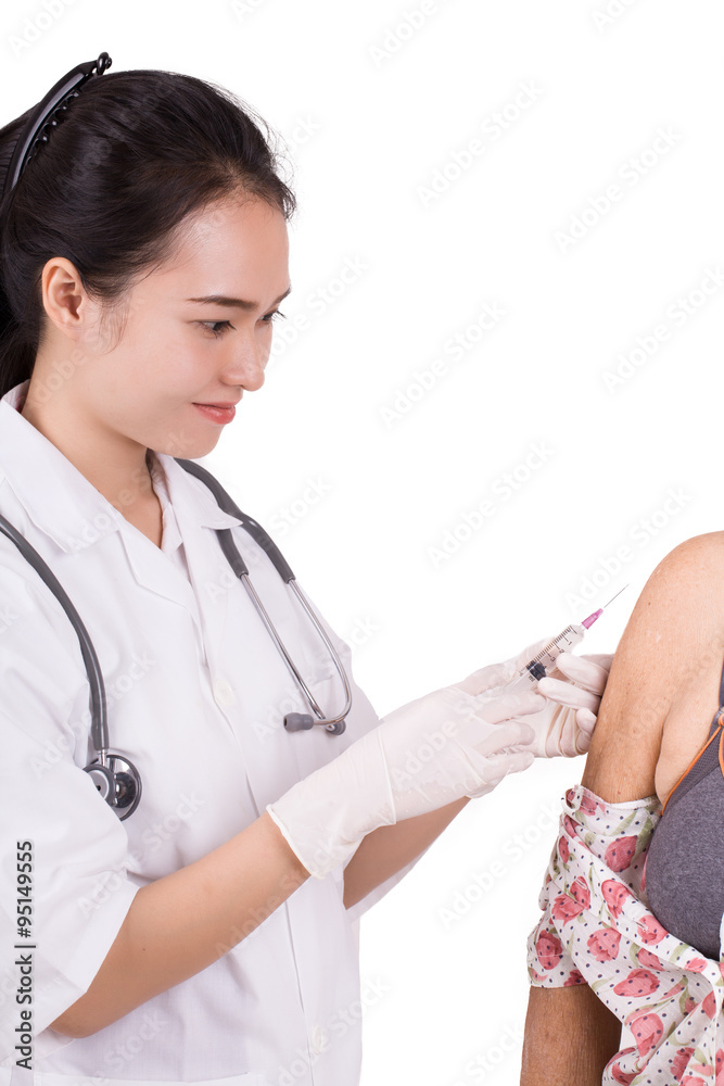 Nurse injecting a patient Stock Photo | Adobe Stock