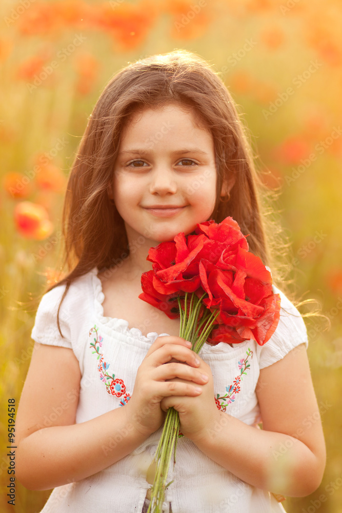 Happy Little Girl With Flower