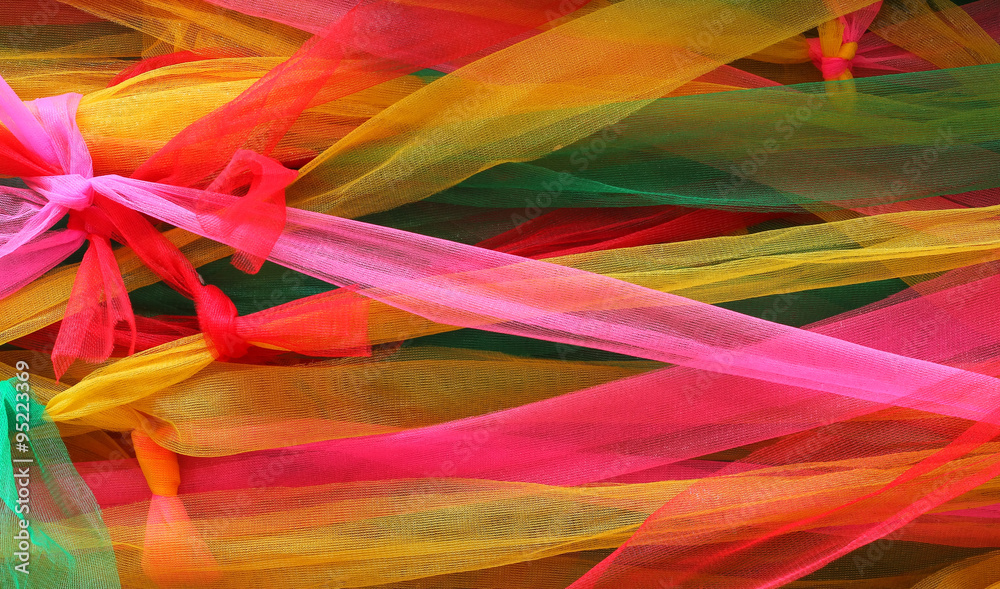 Strips of different colored fabric ribbons decorate a bodhi tree Stock ...