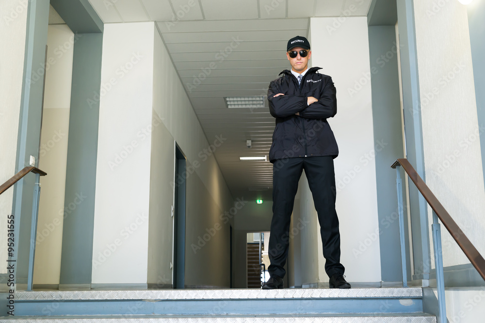 Security Guard Standing At The Entrance Stock-Foto | Adobe Stock