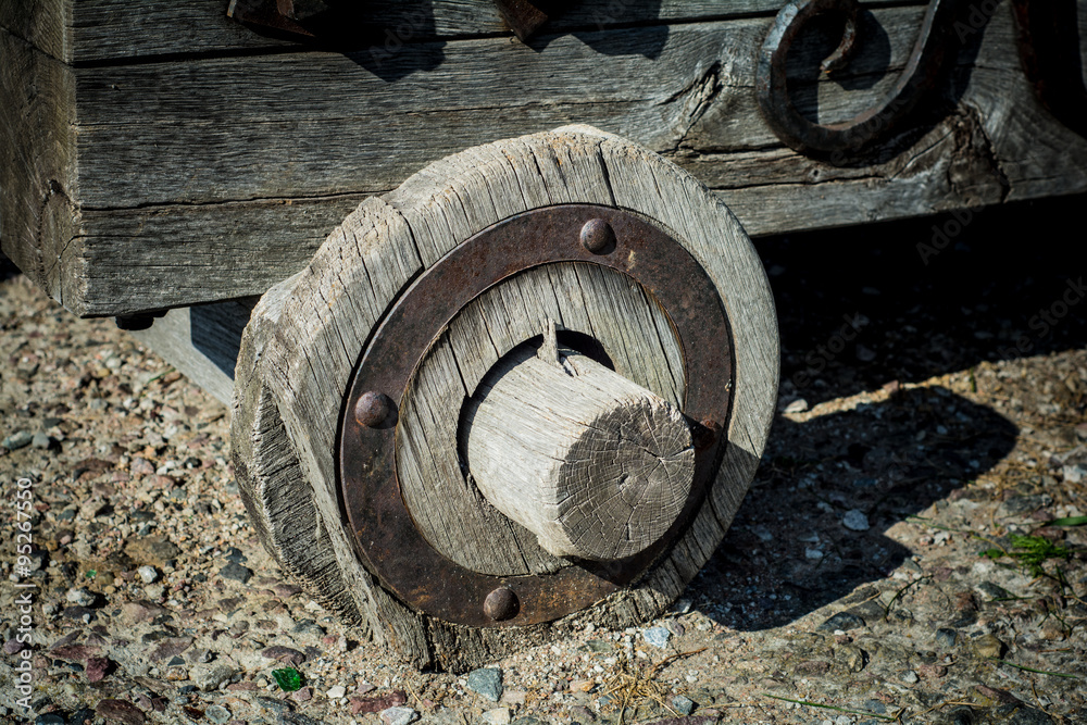 The wheel from the base on which is mounted a cast old weapons, a gun ...