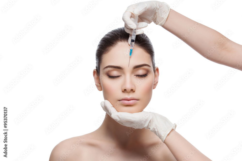 Foto de Woman gets collagen injection do Stock | Adobe Stock