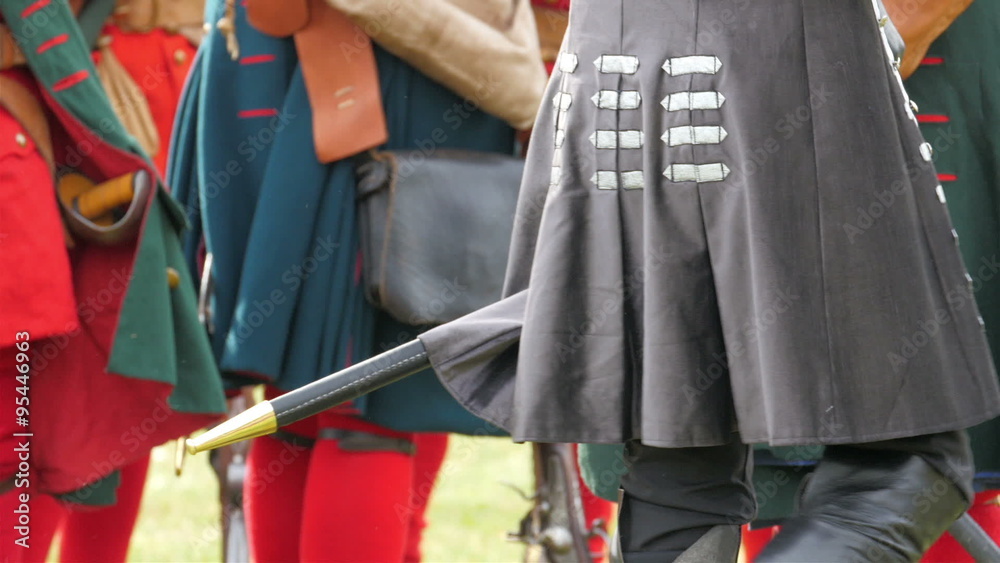 Vidéo Stock The back of the guard showing his sword. The guard is ...