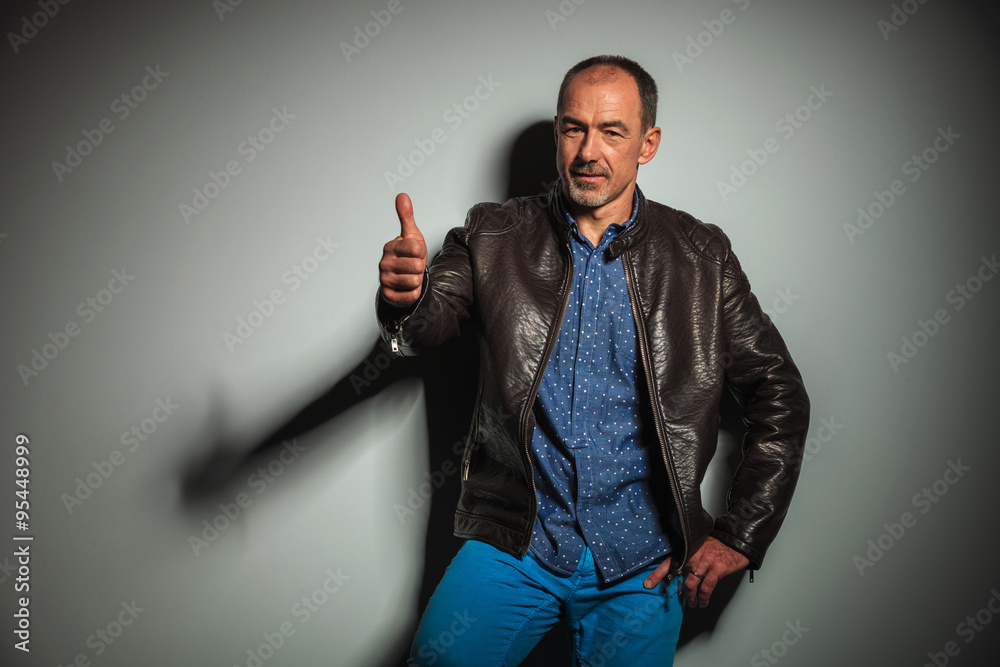 casual old man in leather jacket making the ok sign Stock Photo | Adobe ...