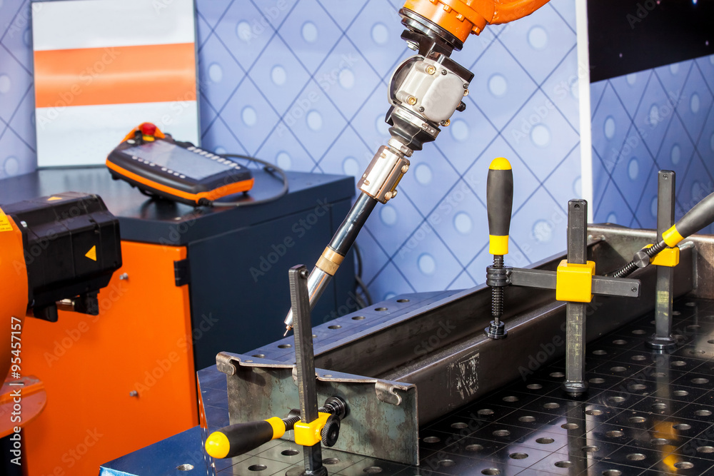 Robot welding process Stock Photo | Adobe Stock