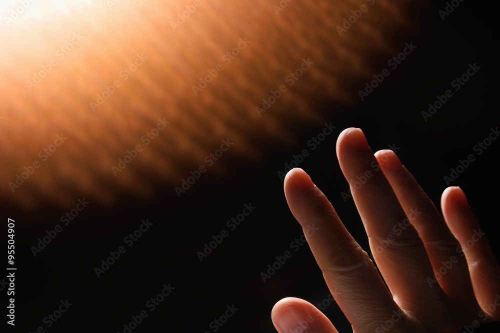 A male human hand reaches out to feel radiating heat. Stock Photo ...
