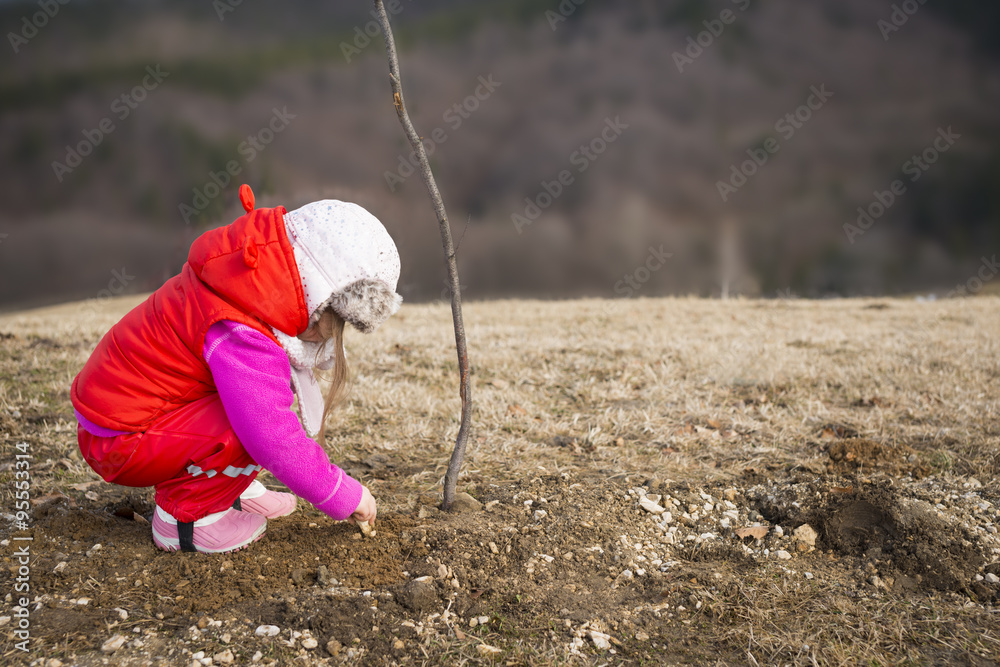 Little girl planting a tree. Ecology concept. Stock Photo | Adobe Stock