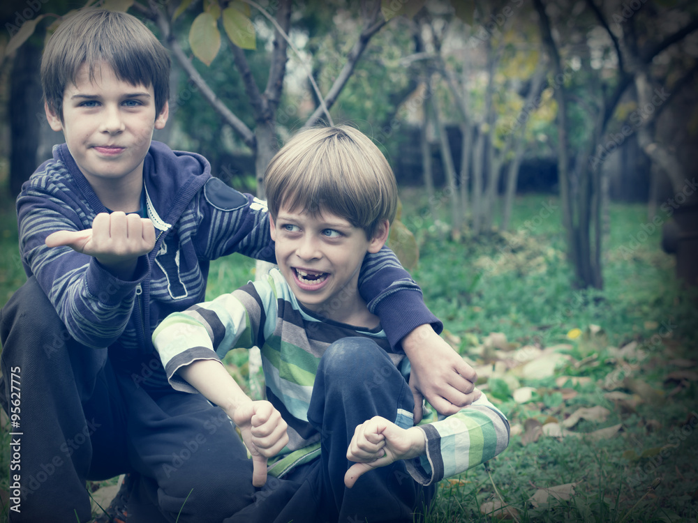 boys playing outside Stock Photo | Adobe Stock