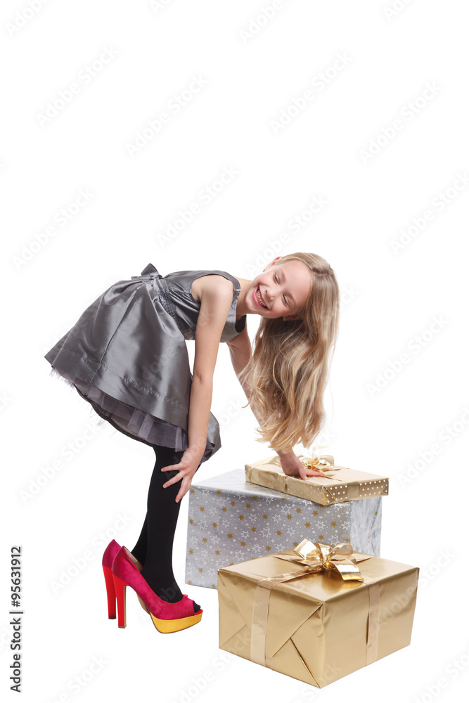 Pretty little girl in high heels isolated Stock Photo | Adobe Stock