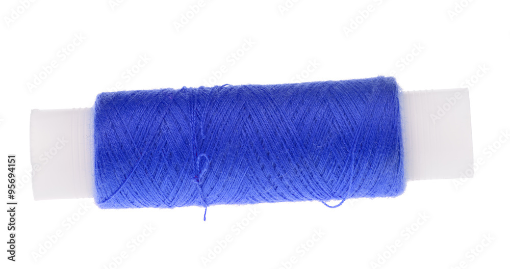 spool of blue thread isolated on white Stock 写真 | Adobe Stock
