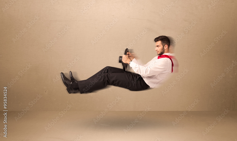Happy funny man driving a flying car concept Stock Photo | Adobe Stock