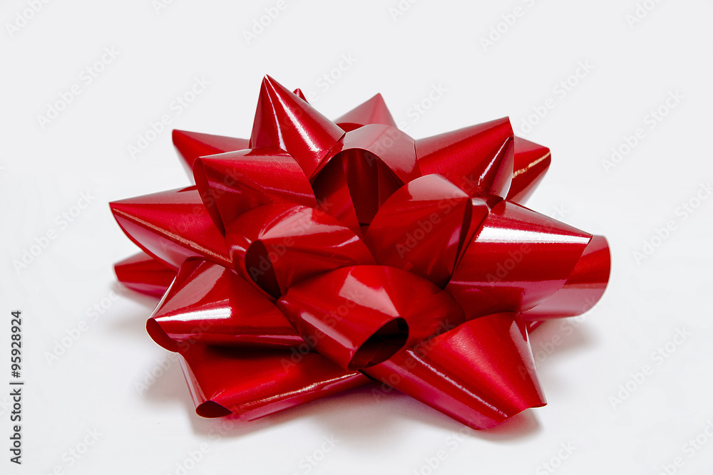 Big, shiny, red, bow. Stock Photo | Adobe Stock