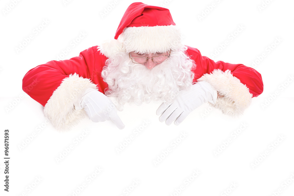 Kind Santa Claus looking out from behind the blank sign isolated on ...