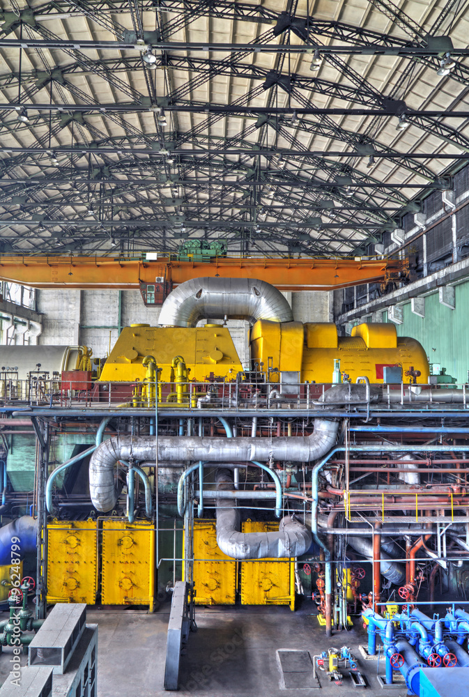 Machine room in thermal power plant with electric generators and ...