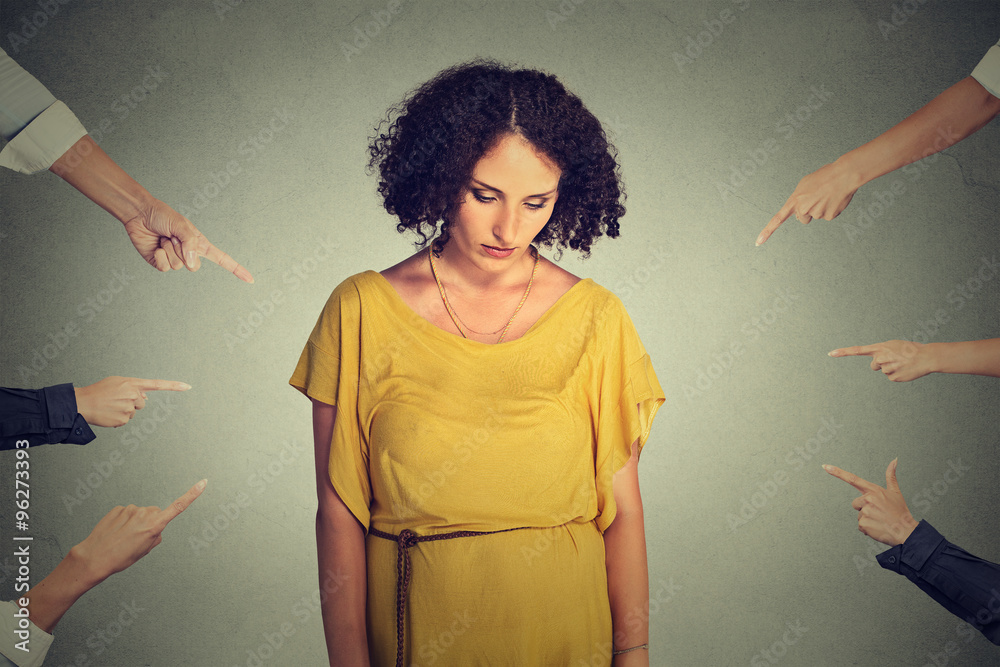 Accusation guilty person girl. Sad embarrassed woman looking down many ...
