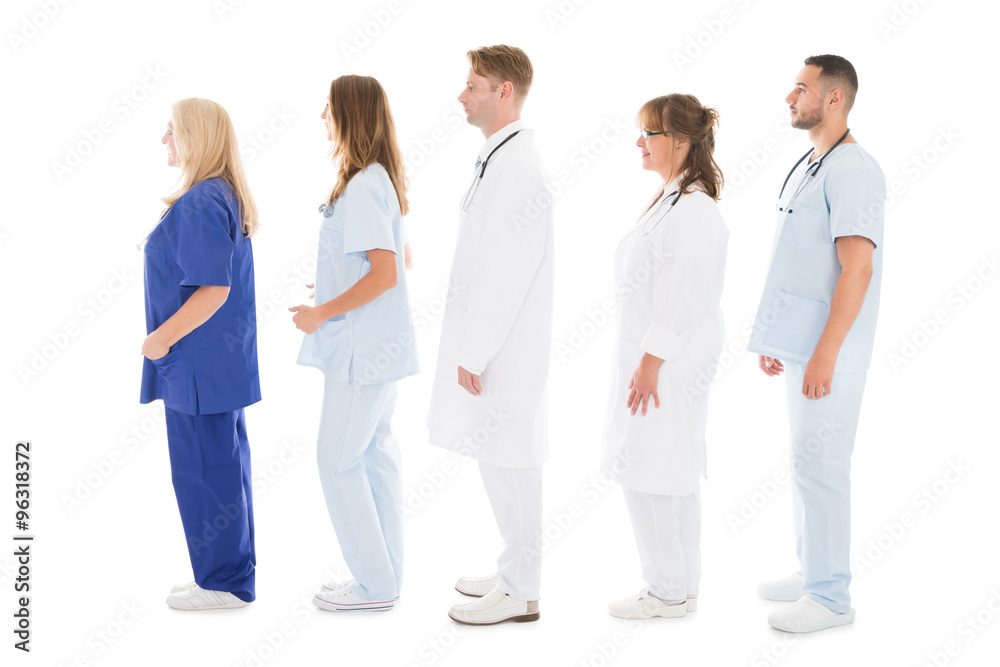 Side View Of Medical Professionals Standing In Row Stock Photo | Adobe ...