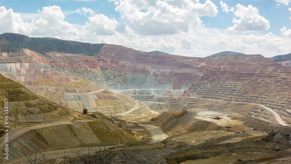 Spectacular panoramic time-lapse of mining trucks in open cast quarry ...