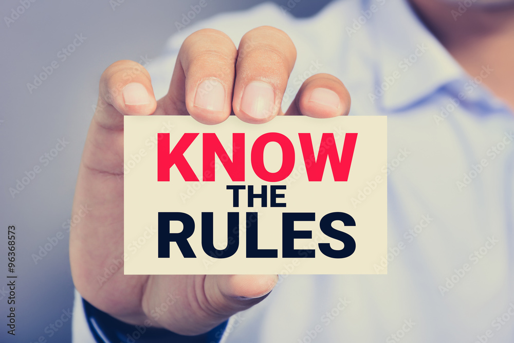 KNOW THE RULES, message on the card shown by a man Stock Photo | Adobe ...