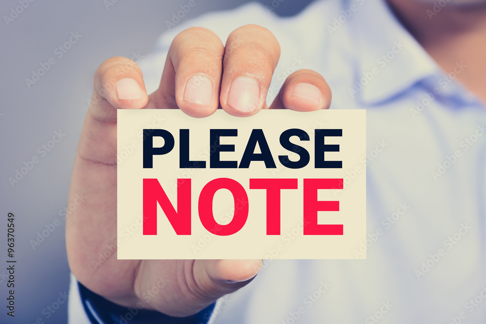PLEASE NOTE, message on the card shown by a man Stock Photo | Adobe Stock