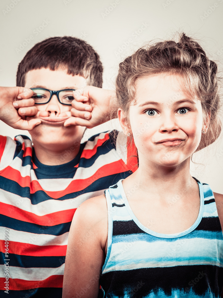Kids little girl and boy making silly face expression. Stock-Foto ... Kids little girl and boy making silly face expression. Stock-Foto ...