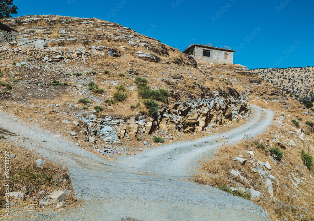 Iraqi countryside in autumn season, with cultivated unpaved road near ...