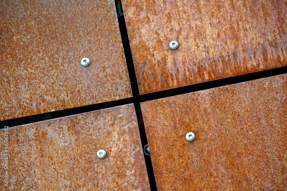 rostige Metallplatten als Fassadengestaltung Stock Photo | Adobe Stock