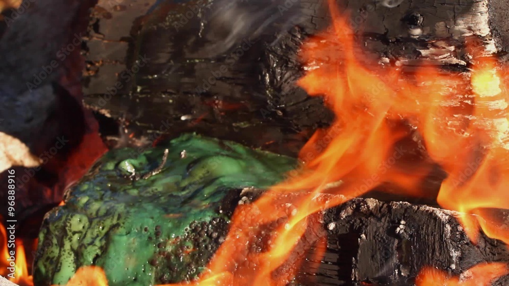 Plastic material burning, melting and dissolving in fire; close up; no ...