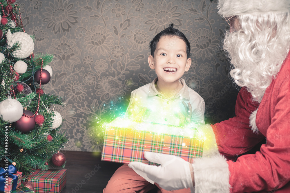 Christmas inspiration! Happy shocked boy surprised to see Santa Stock ...