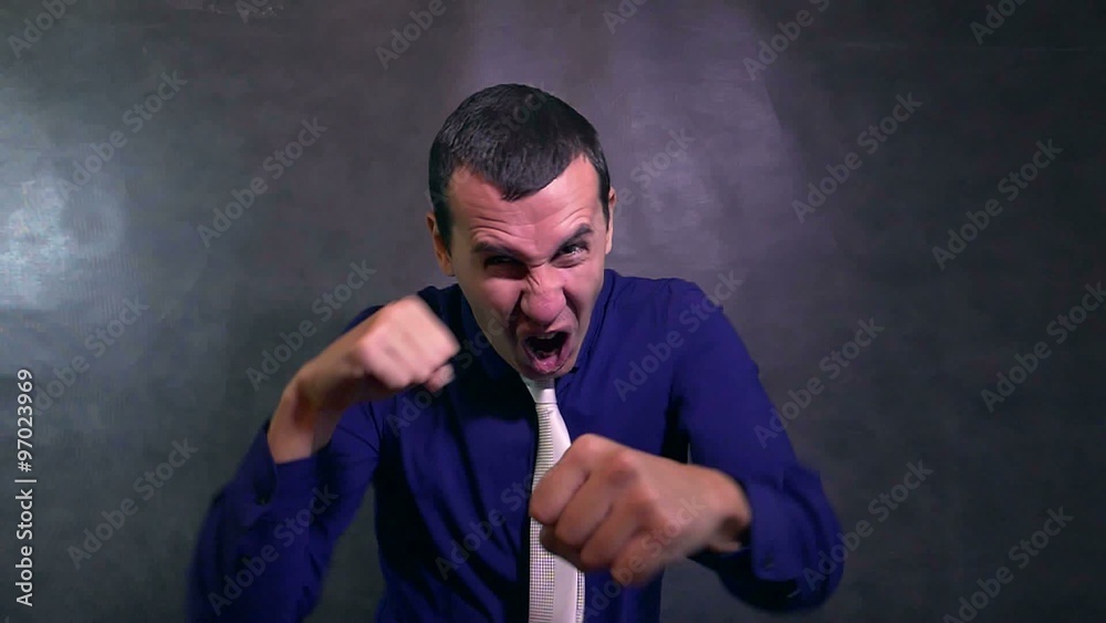 man fights businessman boxing waving his arms angry slow motion Stock ...