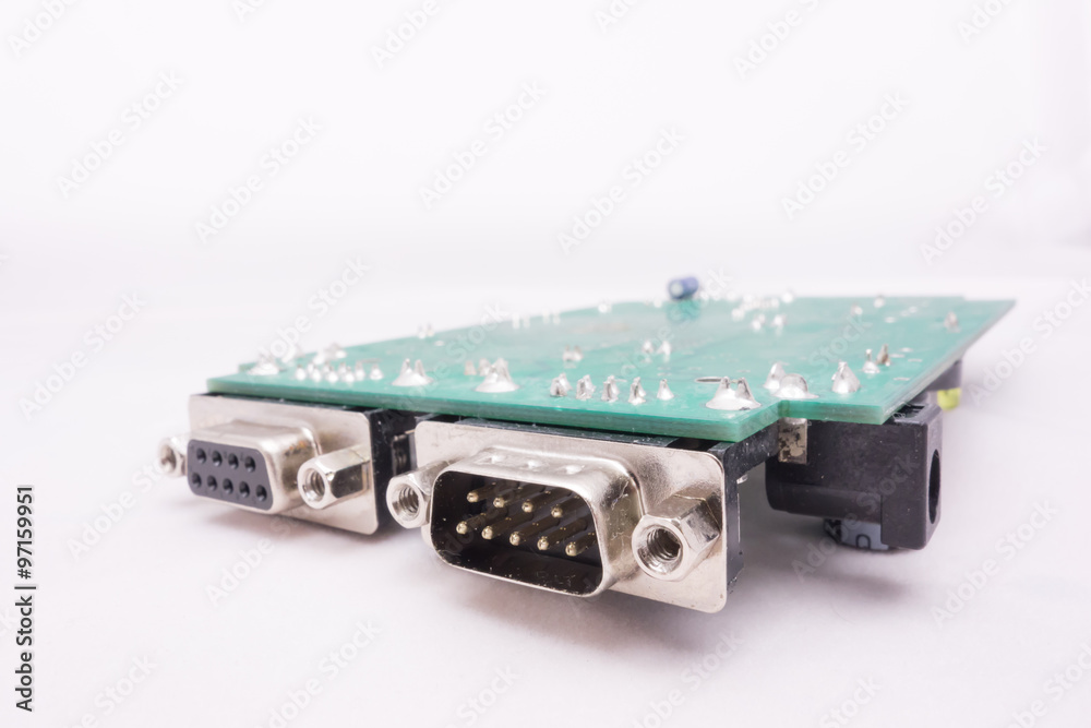 Serial port and green PCB circuit with white background Stock Photo ...