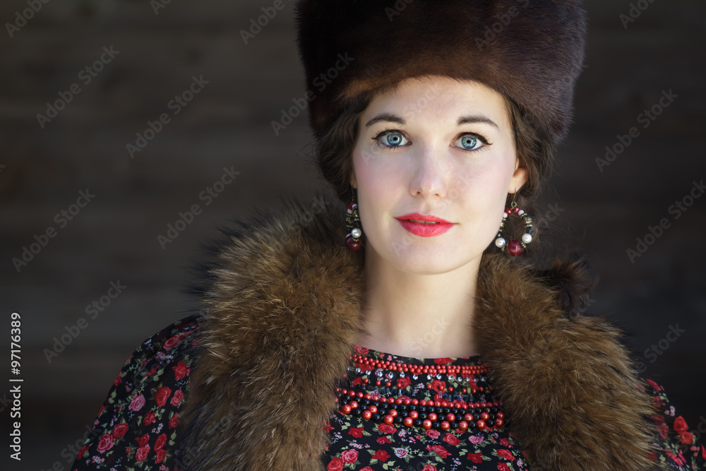 Head and shoulders portrait of Russian beauty with blue eyes wearing ...