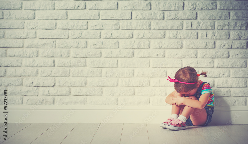 little child girl crying and sad about brick wall Stock Photo | Adobe Stock
