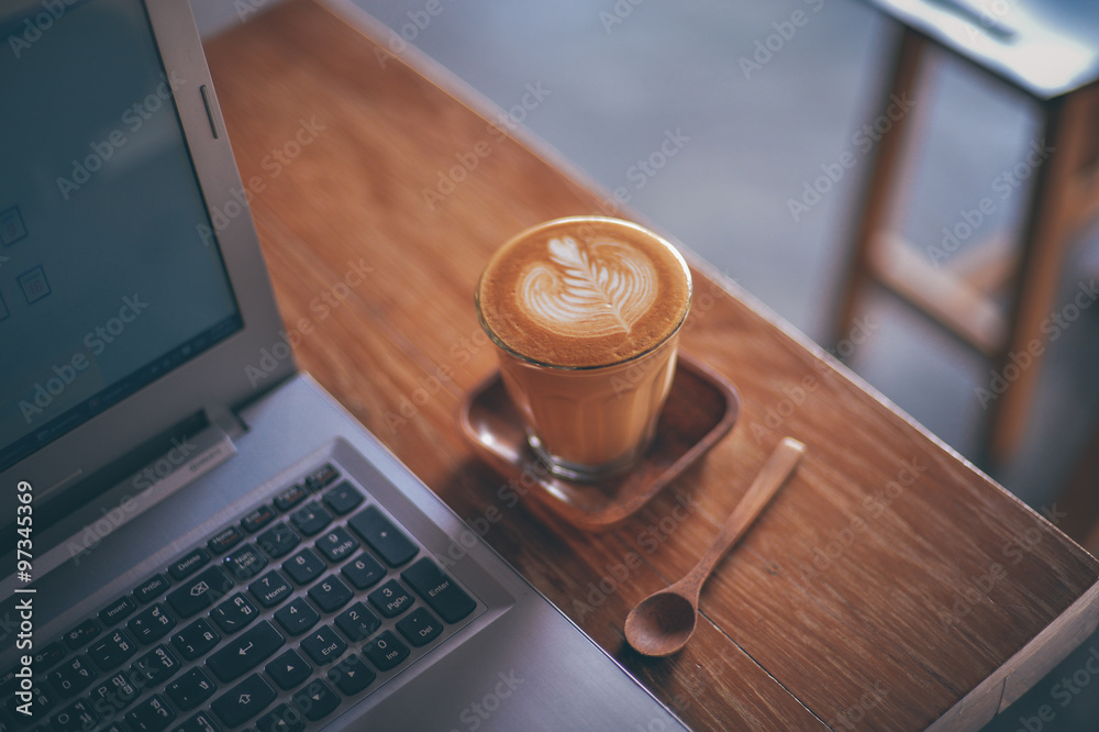 cup of coffee latte on the wood texture in vintage color tone Stock ...