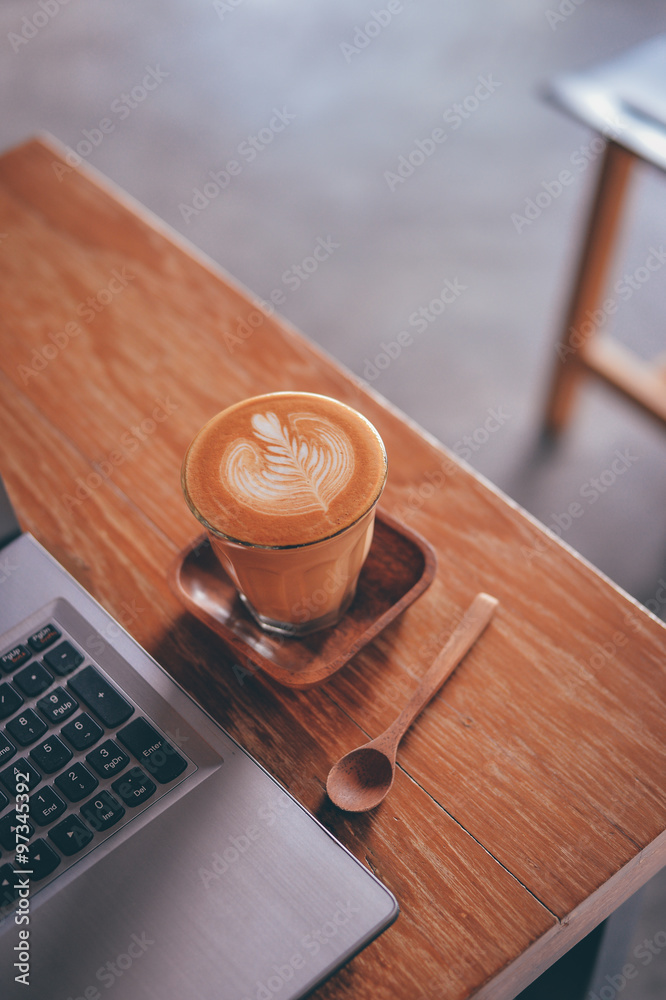 cup of coffee latte on the wood texture in vintage color tone Stock ...