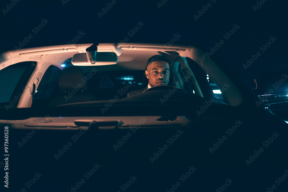 Man Driving Car At Night