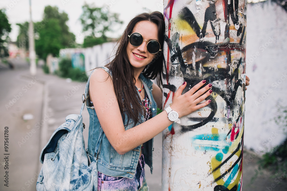 Young sexy woman portrait. Stylish hippie girl posing on the street ...