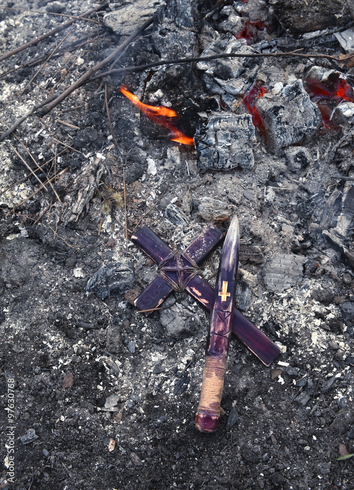 Fotografia do Stock: Wooden cross and stake on ash by fire | Adobe Stock