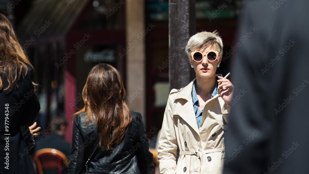Young woman portrait smoking in a street in Paris, France. Stock-Foto ...