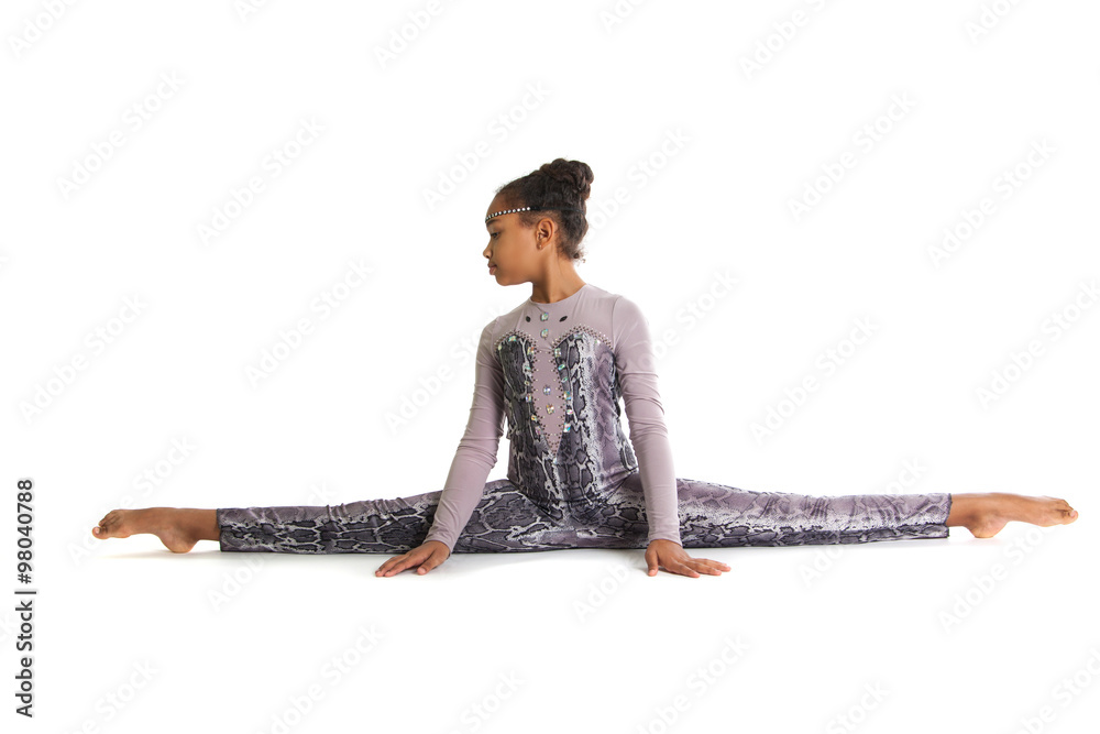 little girl doing gymnastics. transverse split sitting on the floor ...