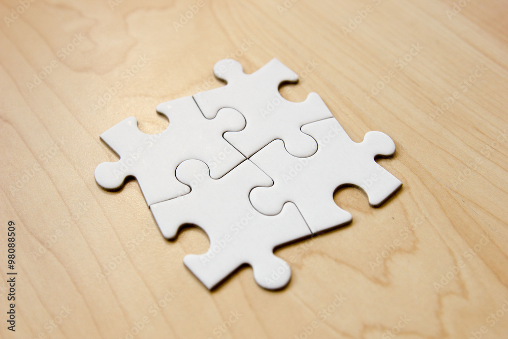 Vier Puzzleteile Stock-Foto | Adobe Stock